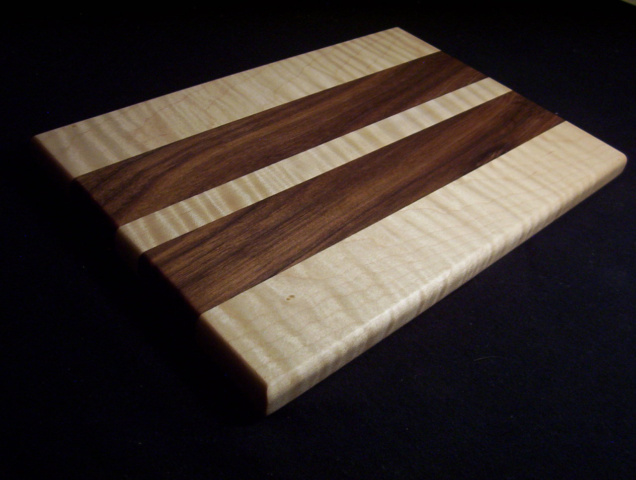 Cutting Boards A variety of cutting boards made... Cutting Boards A variety of cutting boards made...